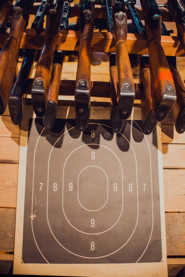Close Up on Shot Target Shield and Assault Rifles Stock Image - Image ...