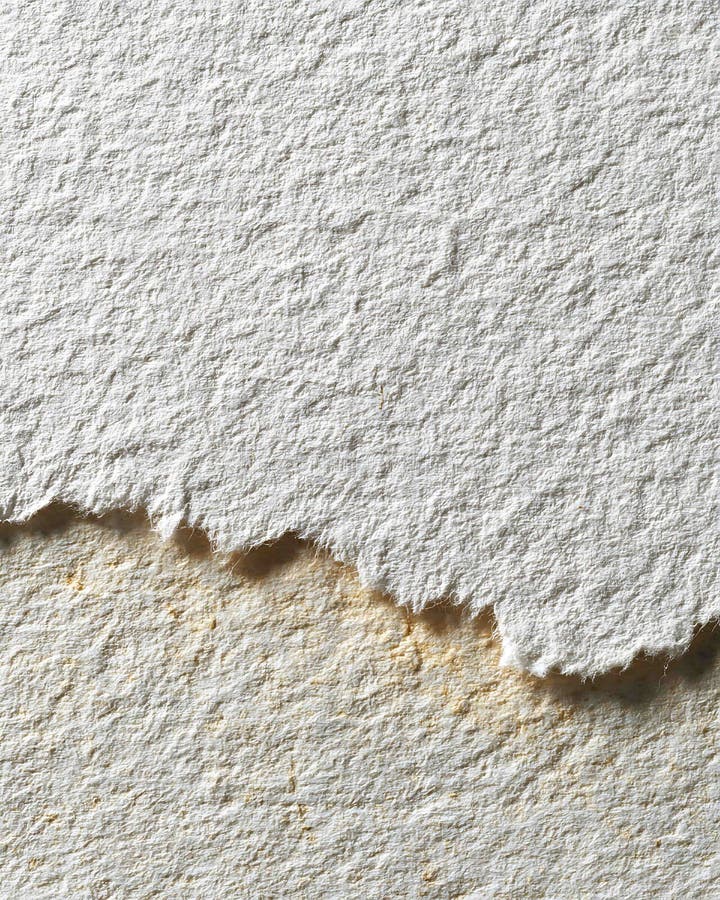 Close Up of Textured White Paper with a Torn Edge Revealing a Cream ...