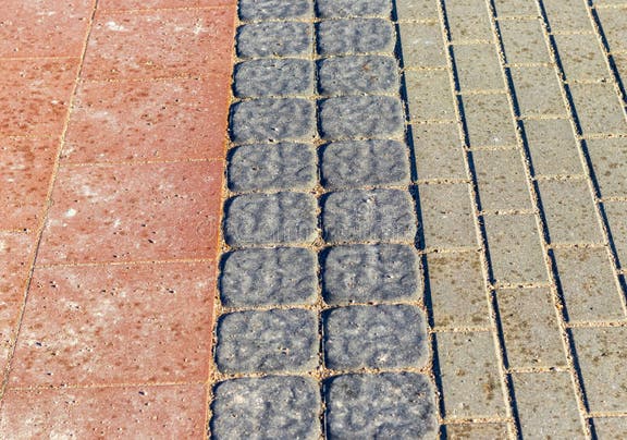 Close Up Shot of the Three Types of Interlock Bricks. Texture Stock ...