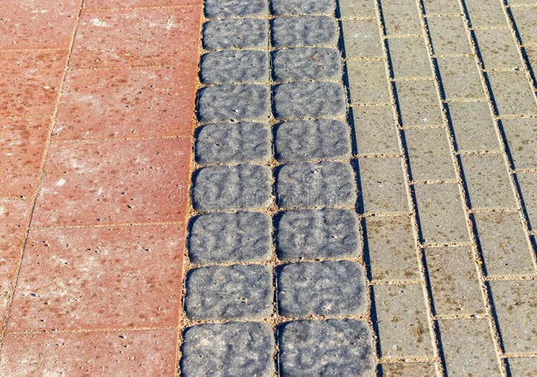 Close Up Shot of the Three Types of Interlock Bricks. Texture Stock ...