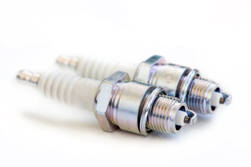 Two spark plugs on white stock photo. Image of spark - 196282826