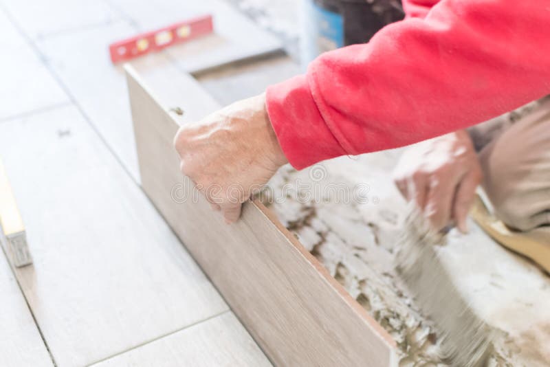 Close Up Shot of Unfinished Floor Tiles Installation in Kitchen Stock ...