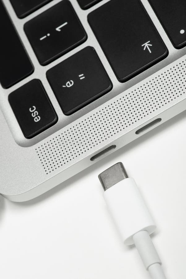 Close Up Shot of Usb C Cable Plugging To a Laptop Computer Stock Photo ...