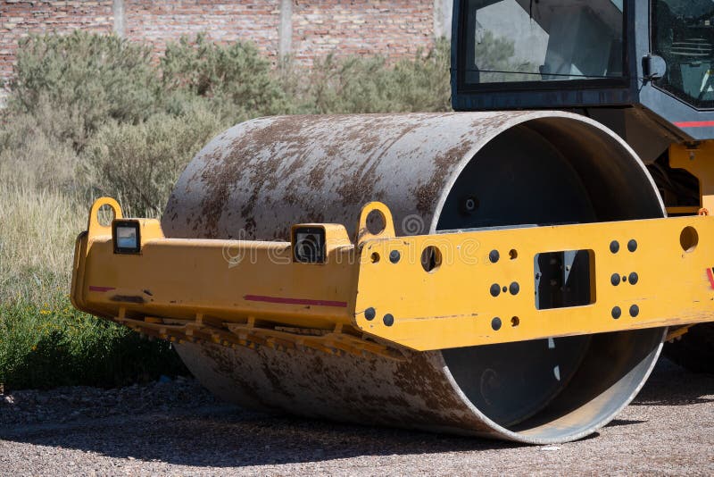Close Up Shot of Vibrating Soil Compacting Roller Machine at Work Stock ...