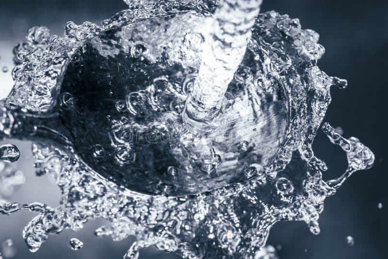 Close Up Shot of Water Splash on Spoon Stock Image - Image of spoon ...