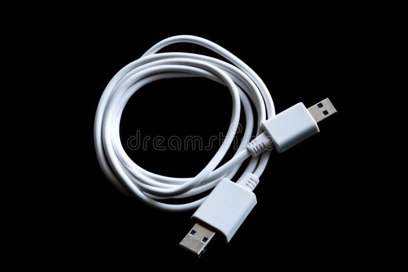 Close-up Shot of a White USB Cable with a Rounded Plug and Flat Wires ...