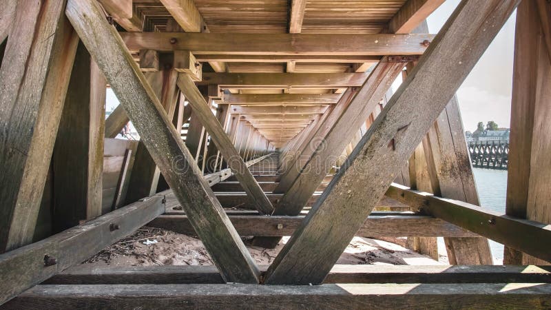 Close-up Shot of Wooden Beams Inside a Bridge Structure Stock Image ...