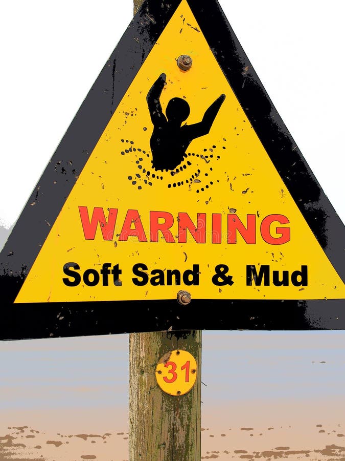 Close-up Shot of a Yellow Warning Triangle Sign for Soft Sand and Mud ...