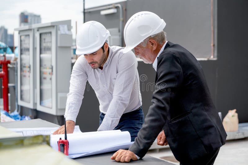 Close Up Shot Young and Senior Engineer Man Work Together Using ...