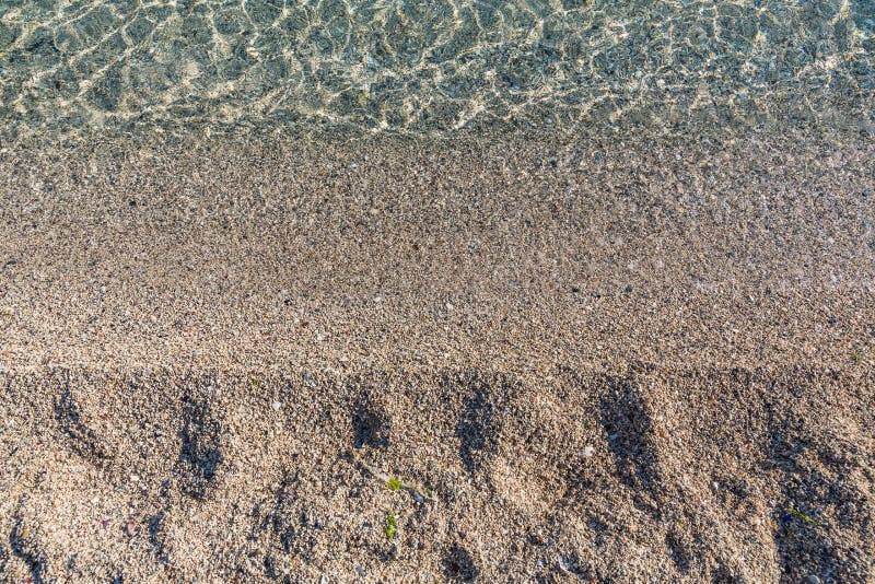 Close Up Shout of Clear Waves Lashing Against the Shore on a Summer Day ...