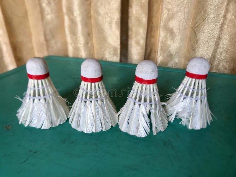 Close Up of the Shuttlecock Isolated on Blue and Yellow Background ...