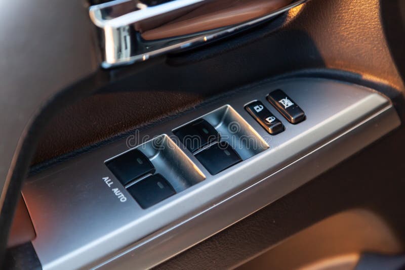 Close-up of the Side Door Buttons: Window Adjustment Buttons, Door Lock ...