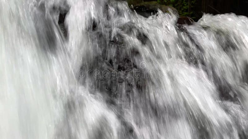 Close-up Side View of Cascading Waterfall Rapidly Flowing Down the ...
