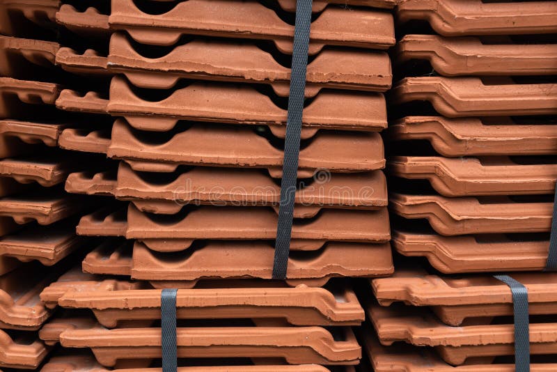 Close Up and Side View of Stack of Orange Roofing Tiles Vibrant Space ...
