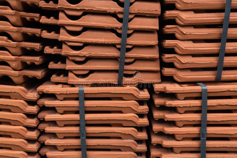Close Up and Side View of Stack of Orange Roofing Tiles Vibrant Space ...