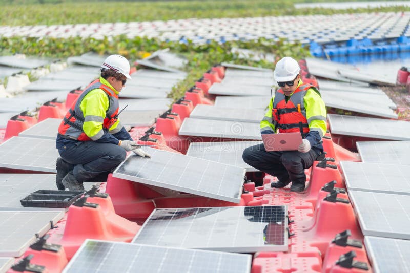 Close Up and Side View Two Professional Technician Workers Hold Solar ...