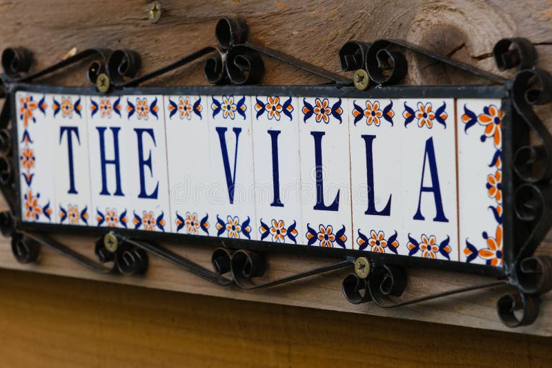 Close Up of a Sign Called the Villa, on a Wooden Wall Stock Image ...