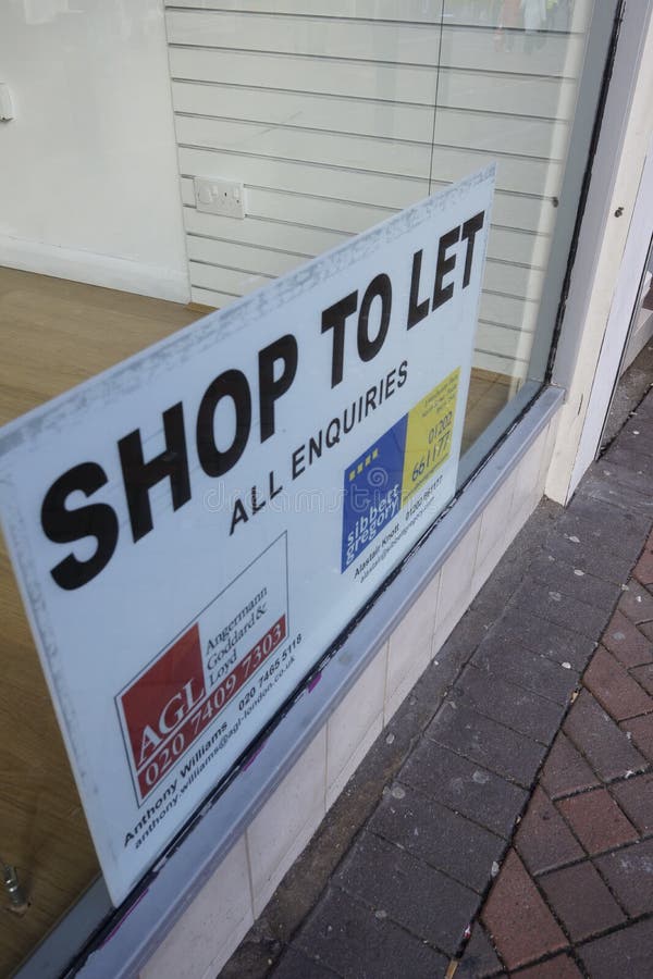 Close Up of a Sign Saying Shop To Let in the Window of an Empty Shop ...
