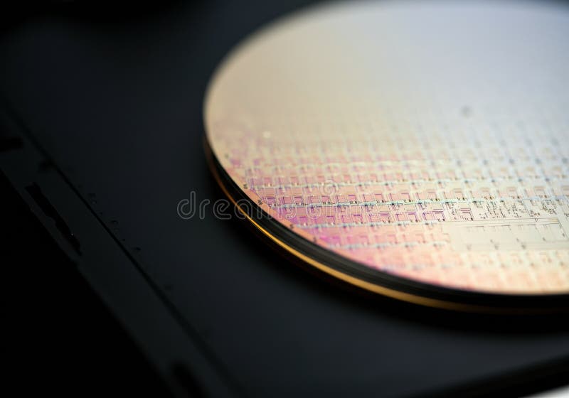Close-up of a Silicon Wafer Showcasing Intricate Patterns and ...
