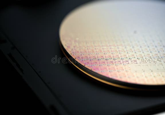 Close-up of a Silicon Wafer Showcasing Intricate Patterns and ...