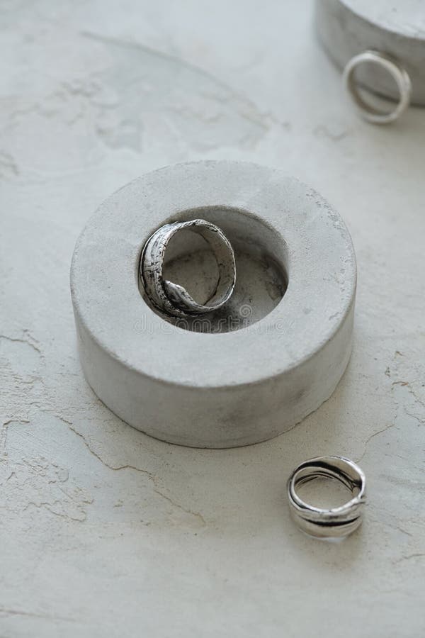 Ring in Plaster Container stock photo. Image of shiny - 228437898