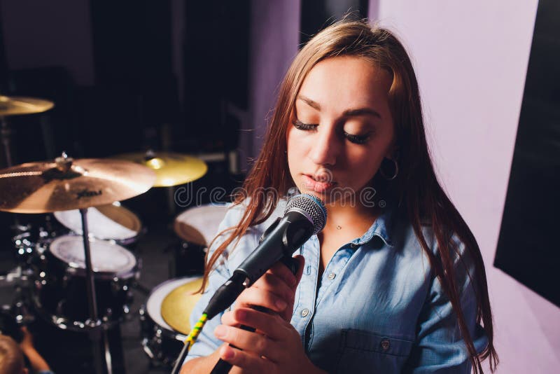 Close Up of a Singer Recording a Track in a Studio. Stock Photo - Image ...