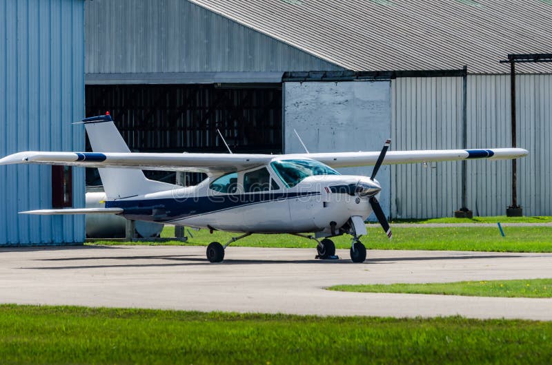 Close-up of a Single Engine Plane in Front of a Hangar Building Stock ...