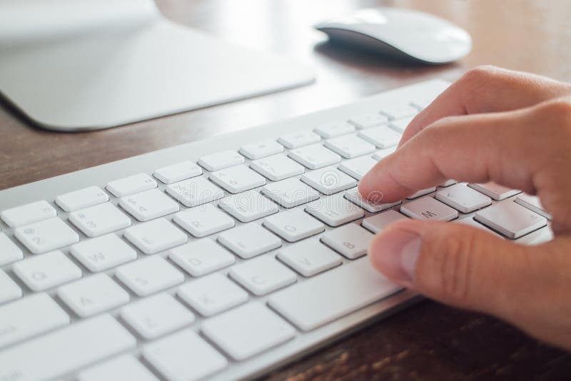 Close Up Single Finger Press Button on Laptop Keyboard Stock Photo ...