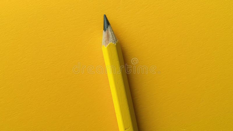 Sharp Yellow Pencil on Vibrant Yellow Background Stock Footage - Video ...