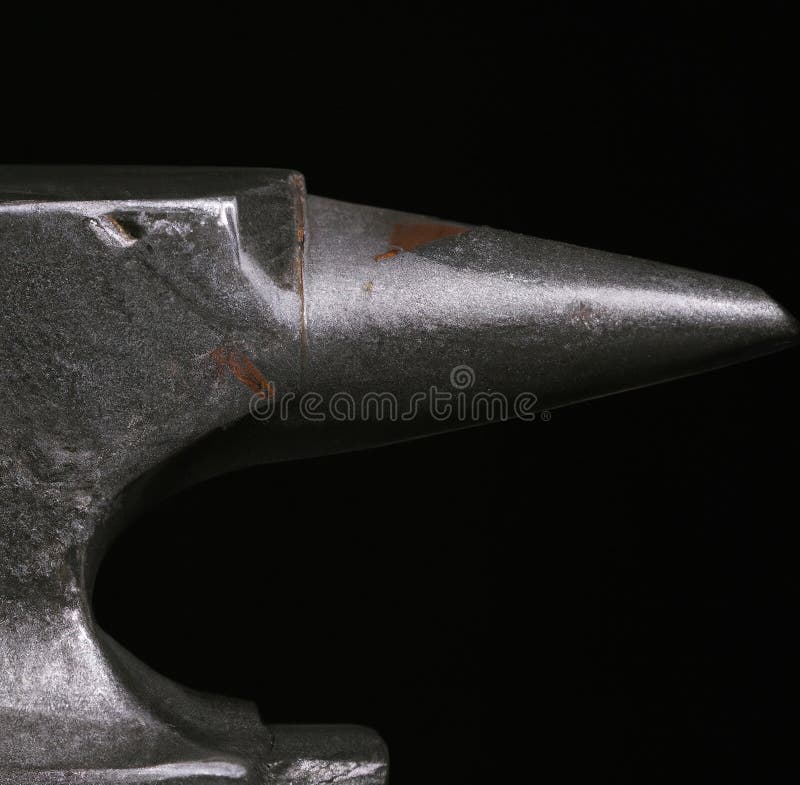 Close Up of Single Steel Anvil Lying on Black Background Stock Photo ...