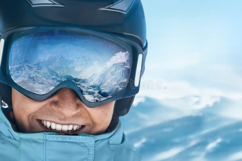 Close Up of the Ski Goggles of a Man with the Reflection of Snowed ...