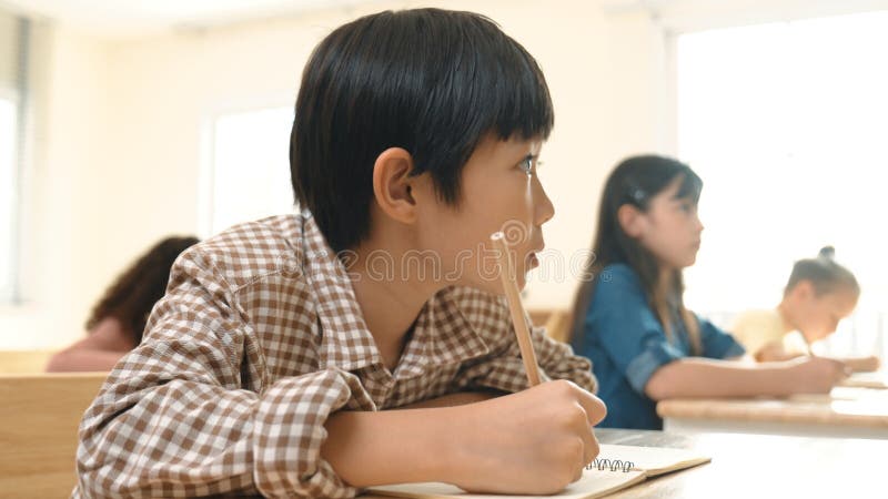 Close Up of Smart Asian Student Writing or Taking a Note during Test ...