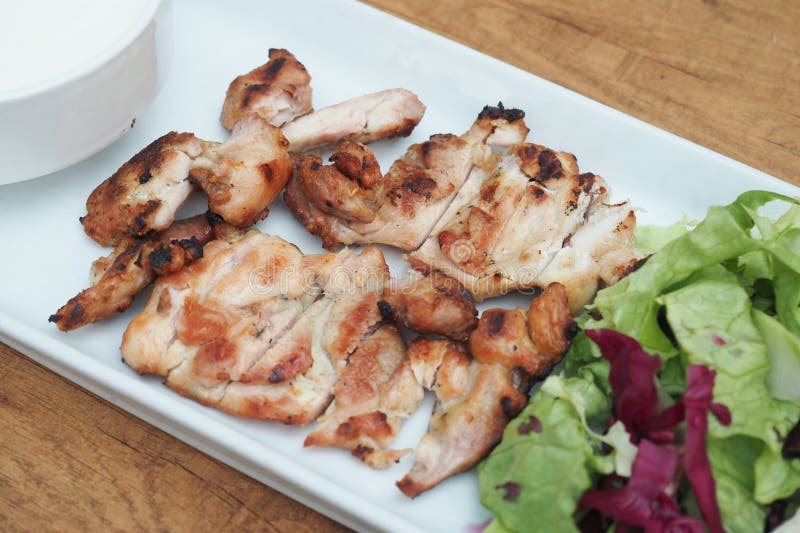 Close Up of Slice of Grill Chicken on a Plate Stock Photo - Image of ...