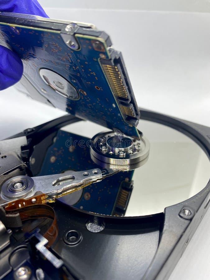 Closeup of Small Hard Disk Reflections on Silver Plate of a Hard Disk ...