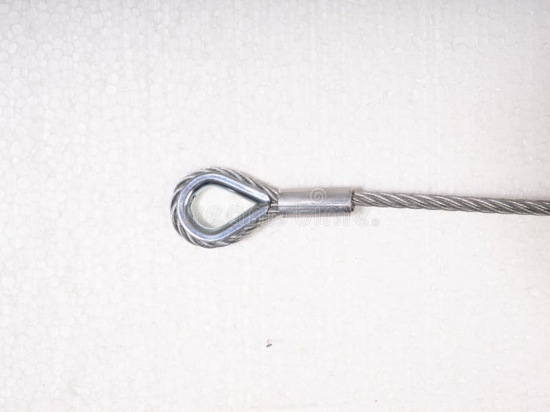 Close-up of Small Metal Loop with Steel Wire on White Background. Stock ...