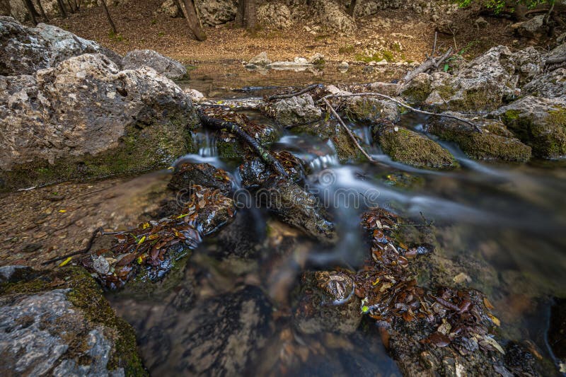 Close Up of a Small Stream Over a Rocky Area Stock Photo - Image of ...