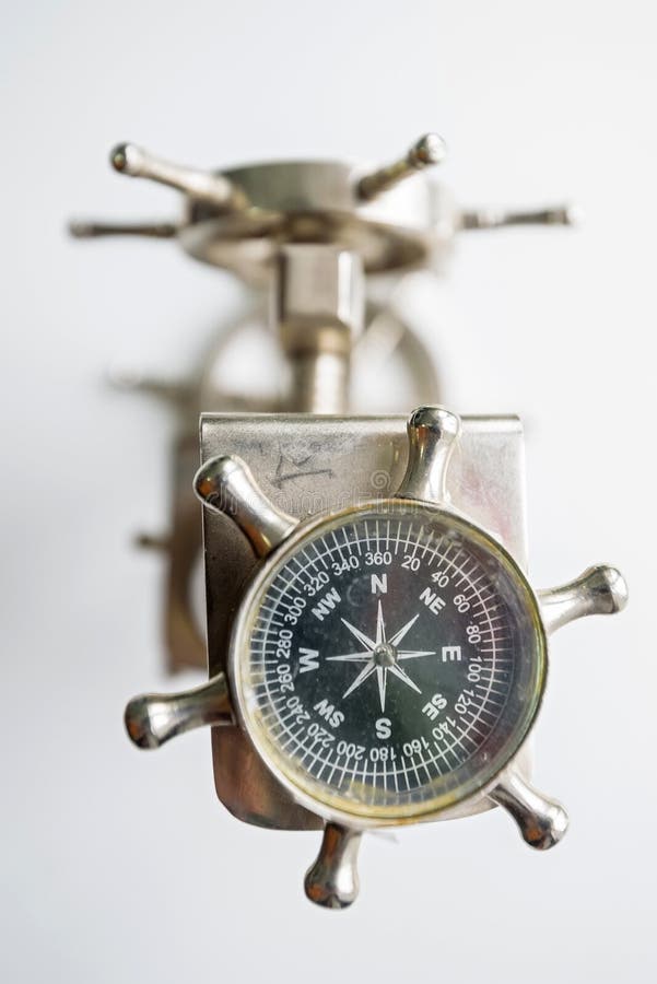 Close Up Small Vintage Compass in Shape of Steer Stock Photo - Image of ...