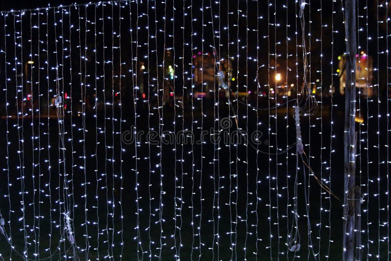 Small White Led Lights Hanging in a Row Stock Image - Image of electric ...