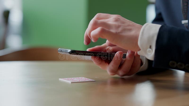 Close-up of Smartphone in Male Hands Tapping on Screen. Unrecognizable ...
