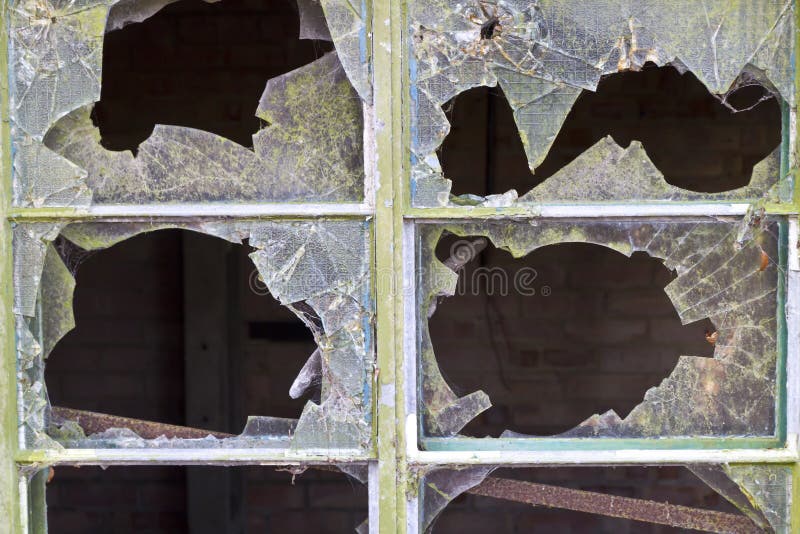 Close Up of Smashed Panes of Glass in a Window Stock Image - Image of ...
