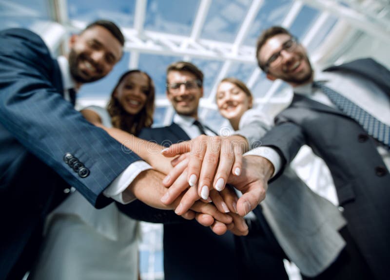Close Up.smiling Business Team Showing Their Unity Stock Image - Image ...