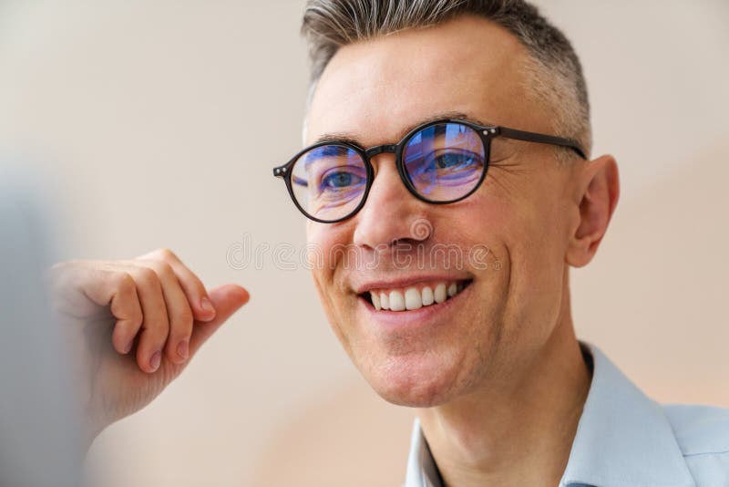 Close Up of a Smiling Businessman Sitting Stock Image - Image of office ... Close Up of a Smiling Businessman Sitting Stock Image - Image of office ...