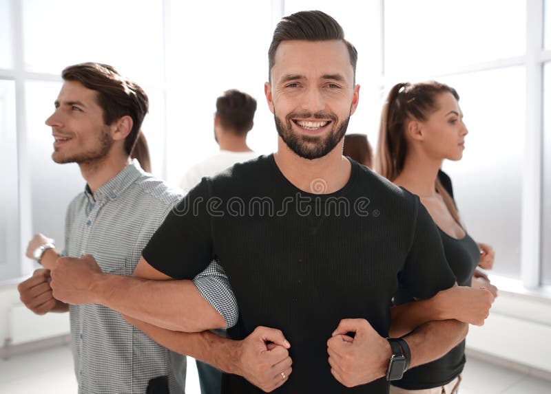 Close Up.smiling Coach, Working with a Business Team Stock Photo ...