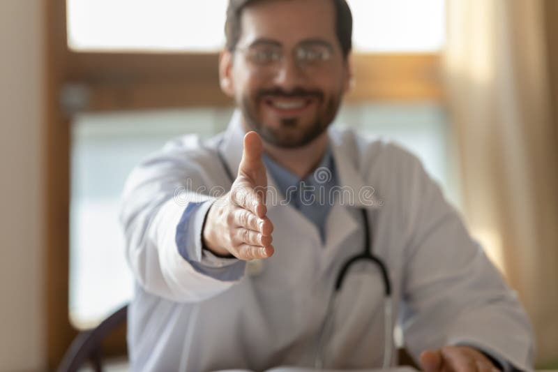 Close Up Smiling Doctor Extending Hand for Handshake To Camera Stock ...