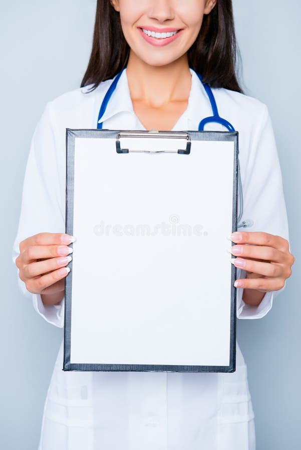 Close Up of Smiling Doctor Showing Blank Folder Stock Image - Image of ...