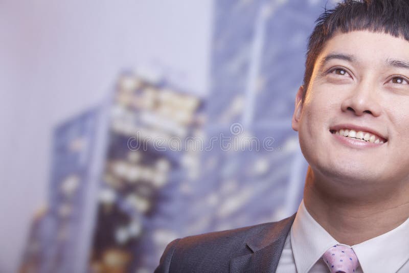 Close-up of Smiling Young Business Man Looking Up Stock Photo - Image ...