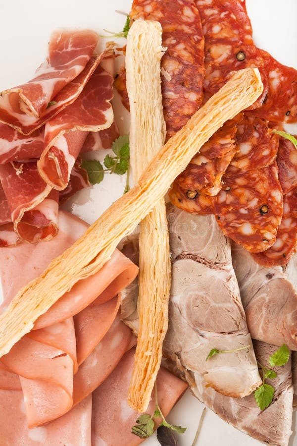 Mixed meat on a plate stock photo. Image of arranged - 51184804