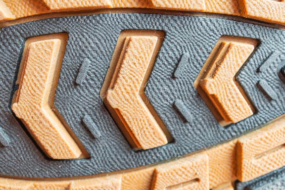 Close-up of Sneaker Outsole with Traction Tread Pattern, Emphasizing ...