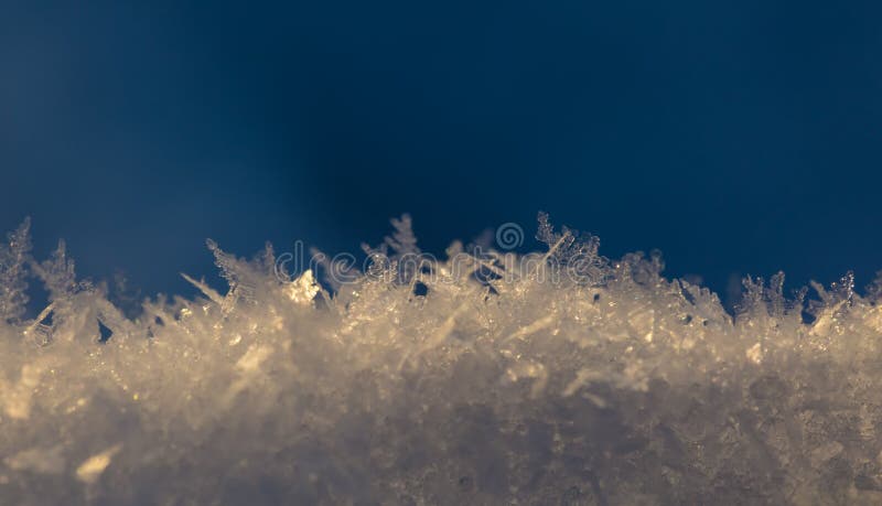 Close up of snow crystals stock photo. Image of bright - 48465428