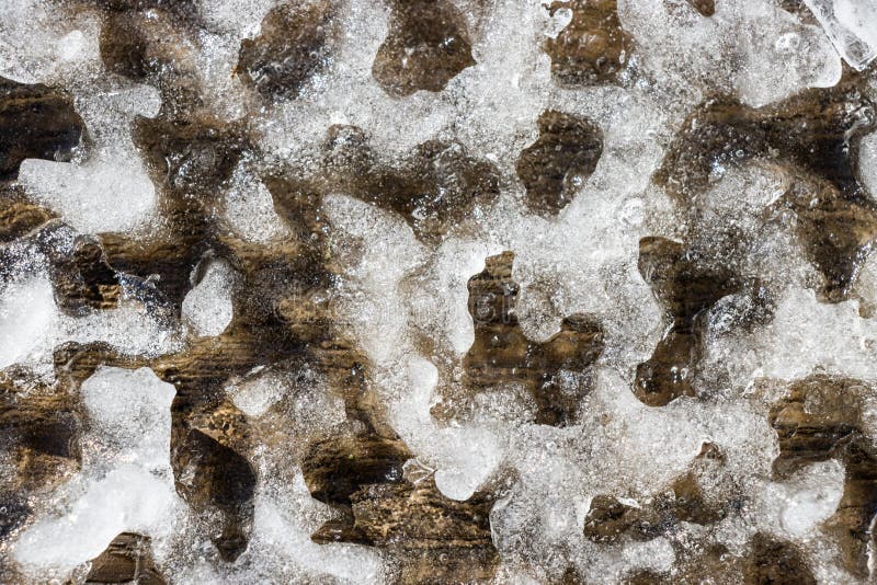 Melting Snow Patterns in the Sunshine Stock Photo - Image of close ...